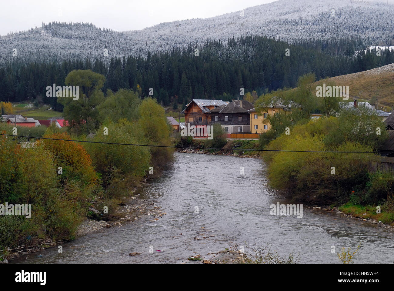 Carlibaba village, Bucovina, Romania. The confluence of Bistrita river ...