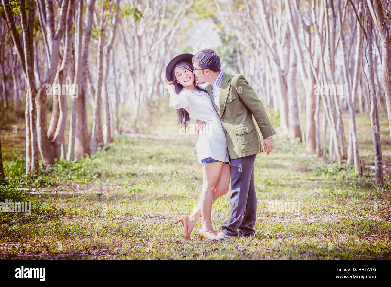 asai young romantic man and woman standing and hugging each other with ...