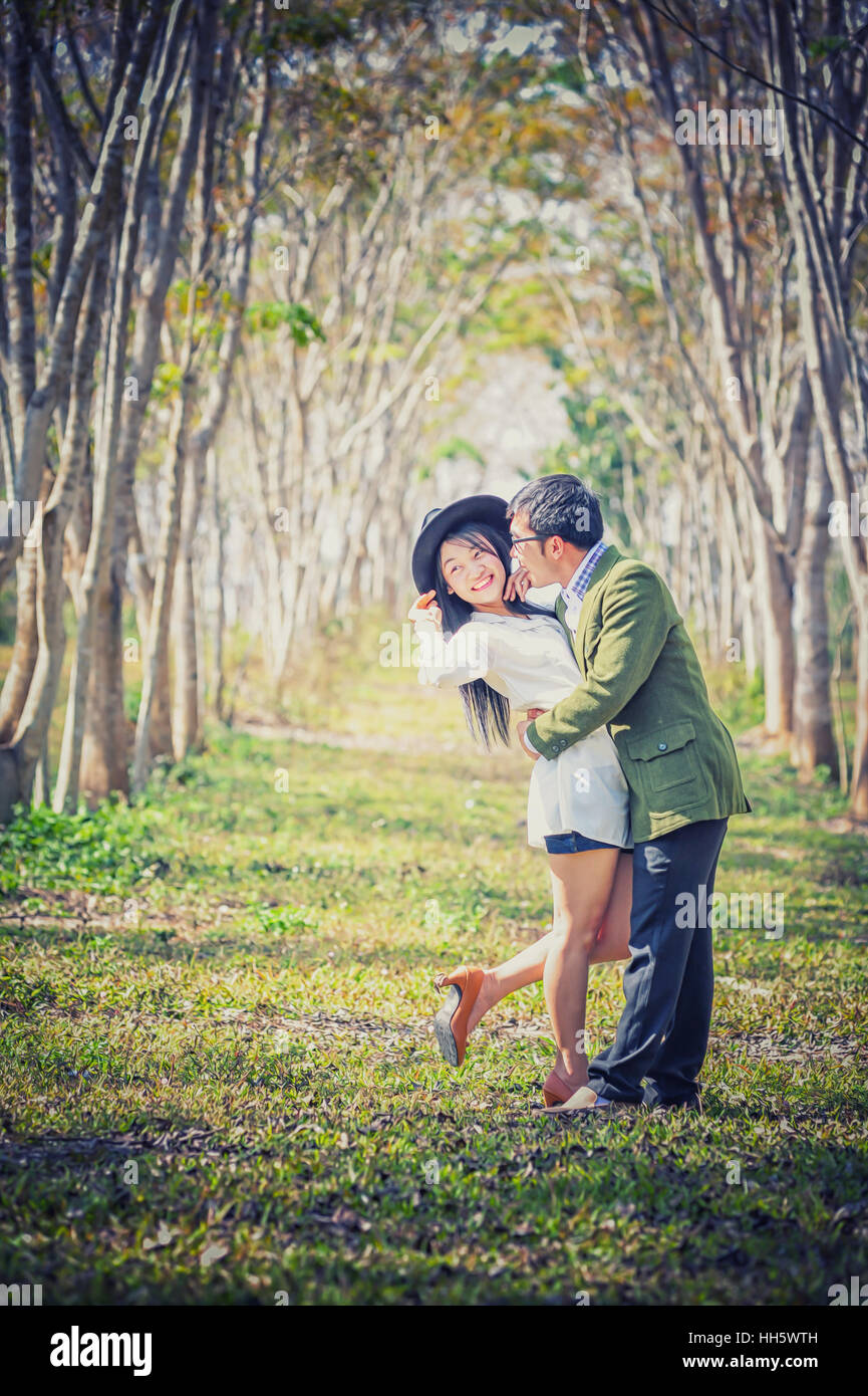 asai young romantic man and woman standing and hugging each other with ...