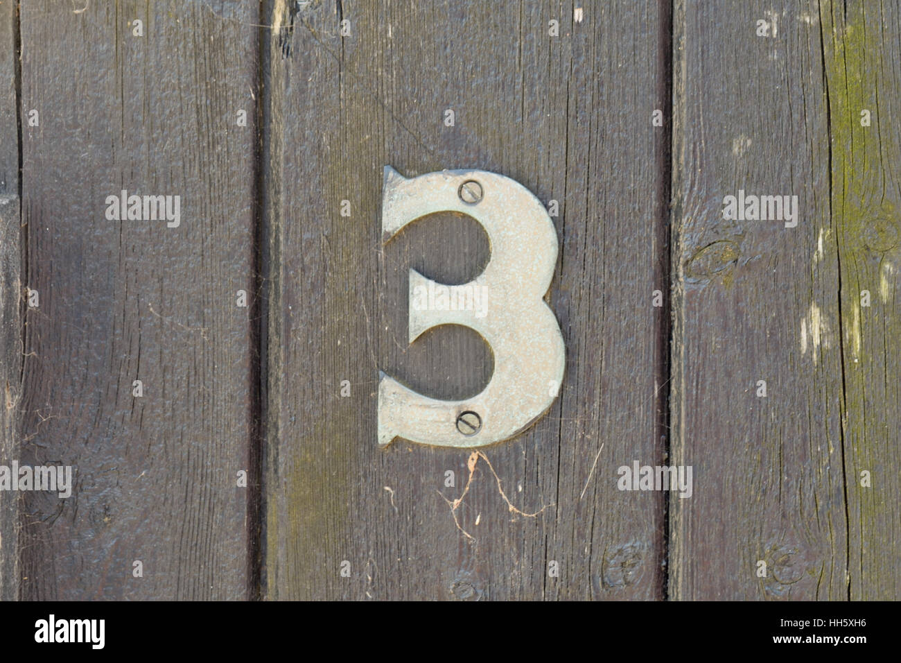 House Number 3 sign on gate Stock Photo - Alamy
