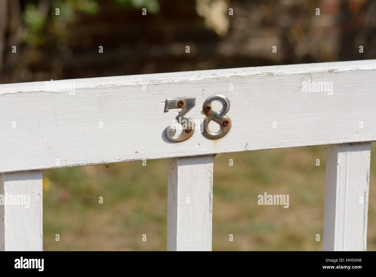 House Number 38 sign on wooden gate Stock Photo - Alamy