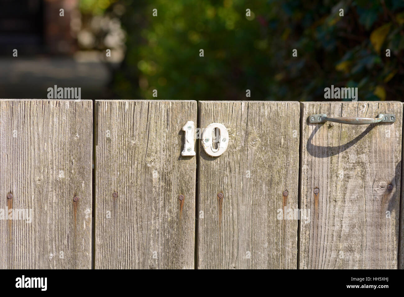 House Number 10 sign on wooden gate Stock Photo - Alamy