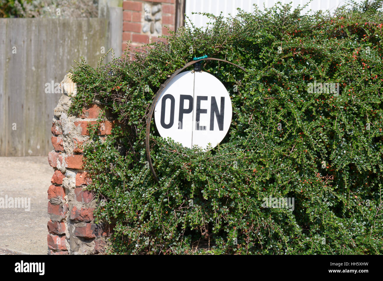 Open sign outside business Stock Photo - Alamy
