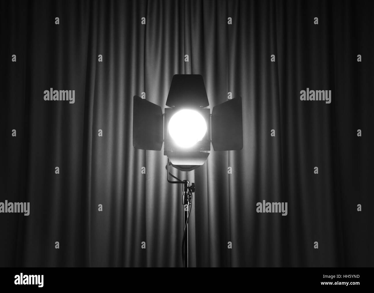 Curtains and projector lights wtih space for your text Stock Photo - Alamy