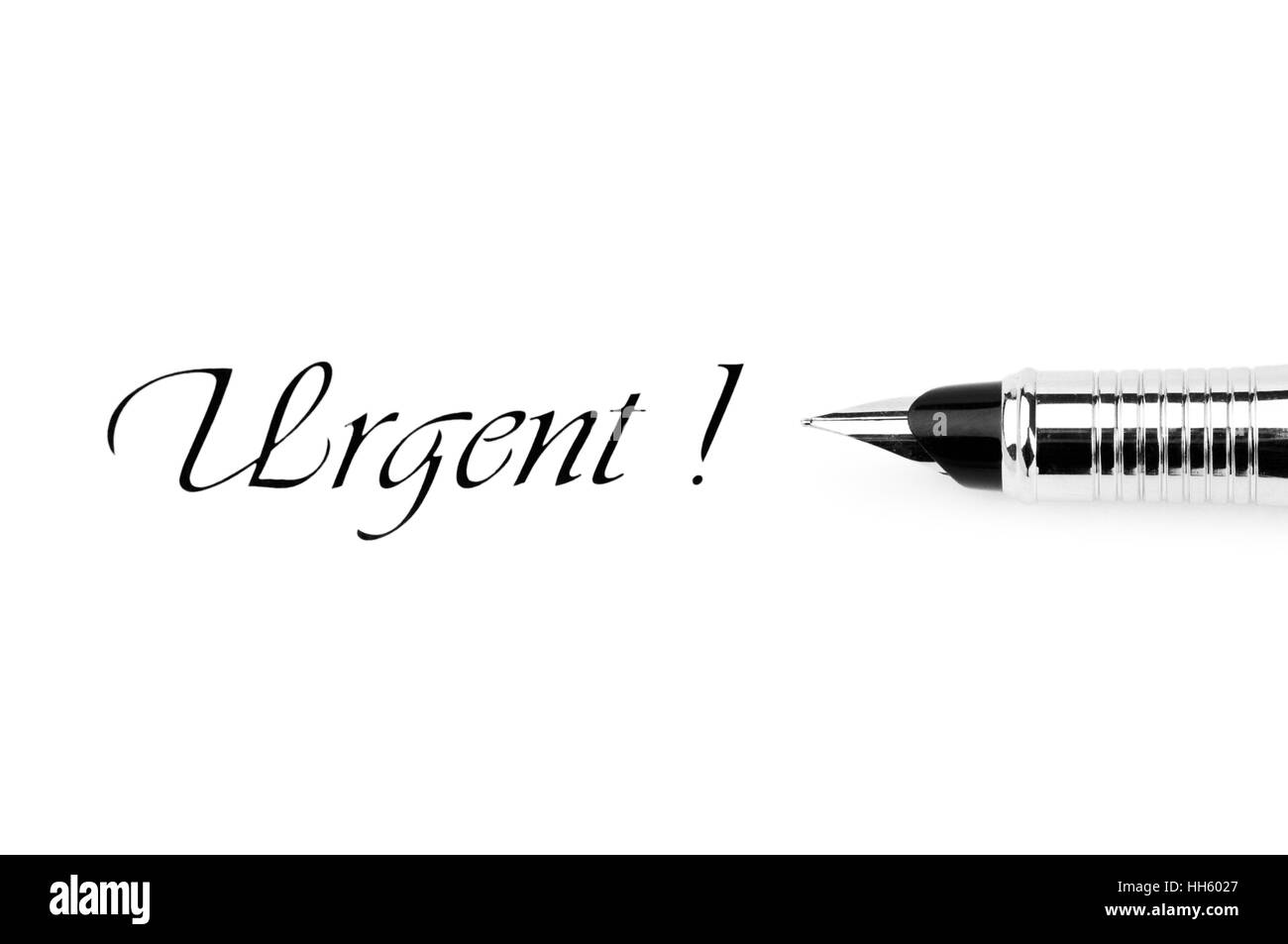 Pen and urgent message isolated on white Stock Photo - Alamy