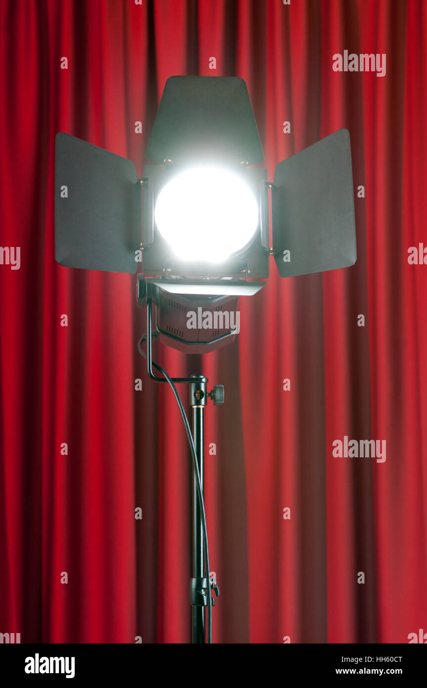 Curtains and projector lights wtih space for your text Stock Photo - Alamy
