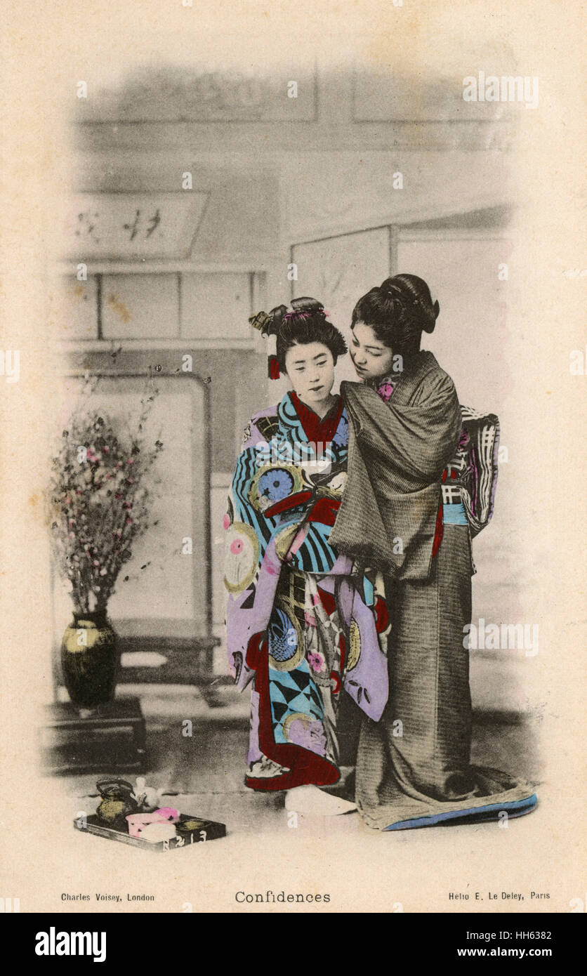 Japan - A Geisha whispers a secret to another fellow Geisha Stock Photo ...