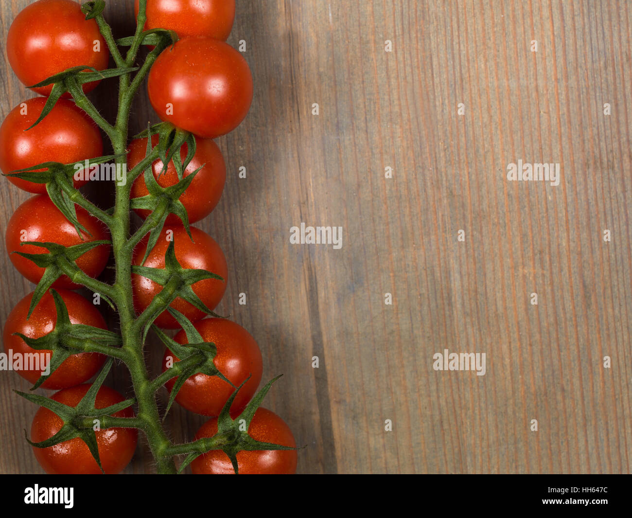 Vine Grown Organic Cherry Tomatoes Stock Photo - Alamy
