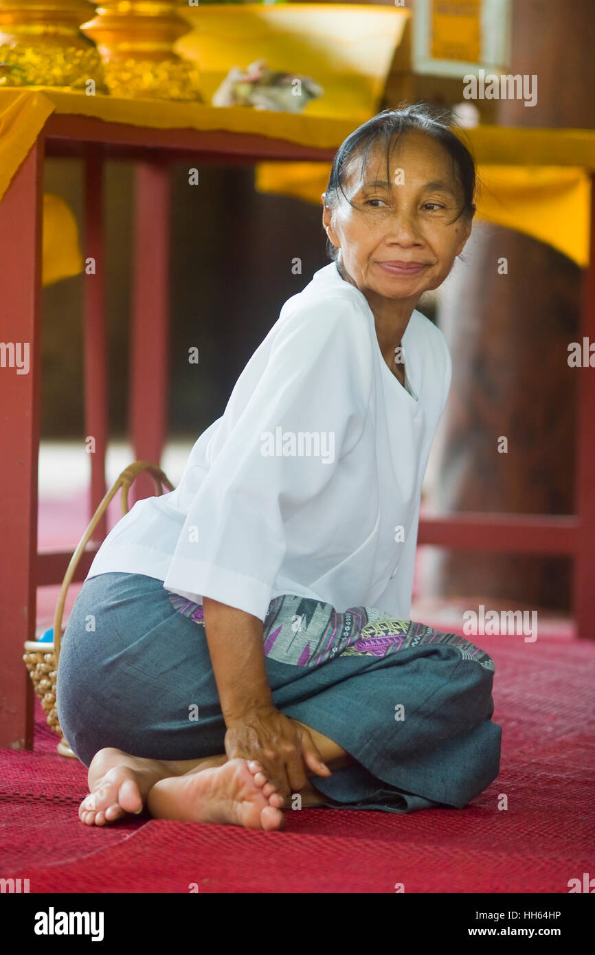 Woman in a temple Stock Photo - Alamy