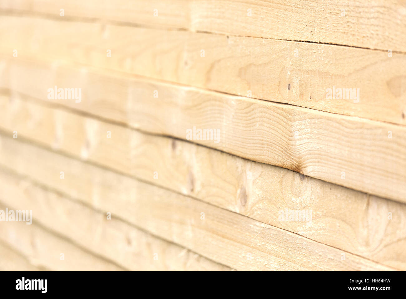Stack of lumber at a building site Stock Photo - Alamy