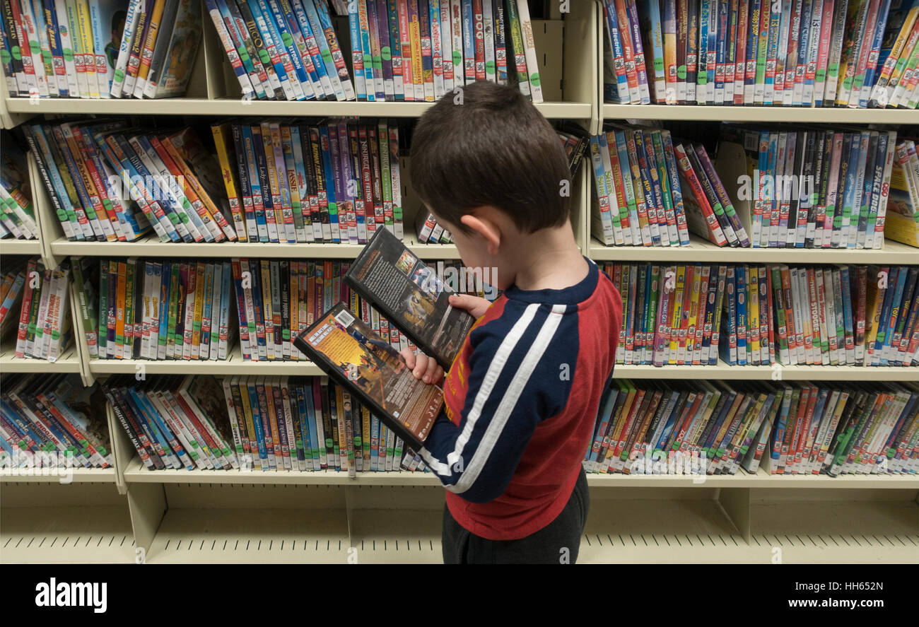 Choosing dvd child hi-res stock photography and images - Alamy