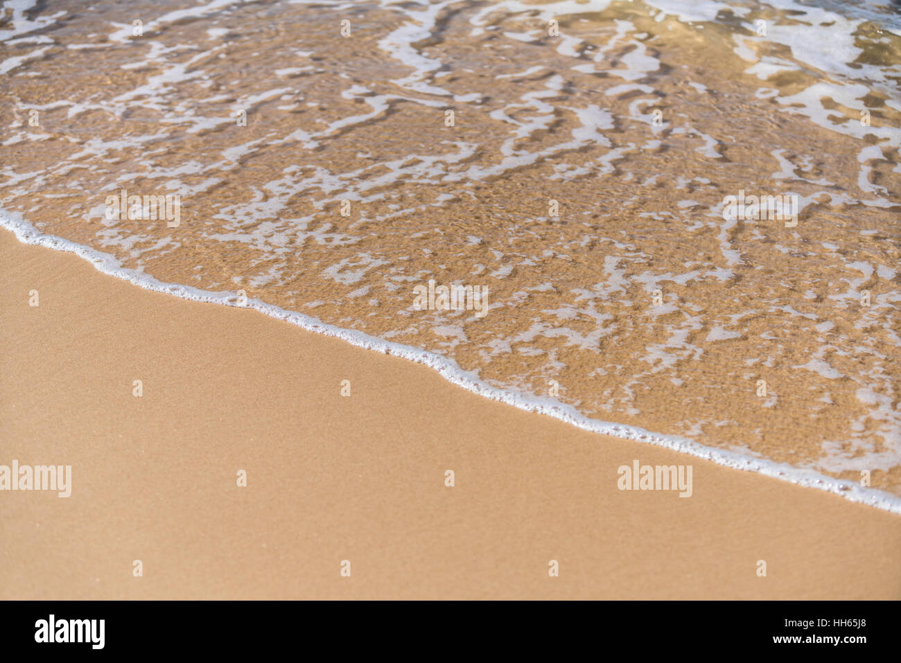 the landscape sea waves close-up on sand Stock Photo - Alamy