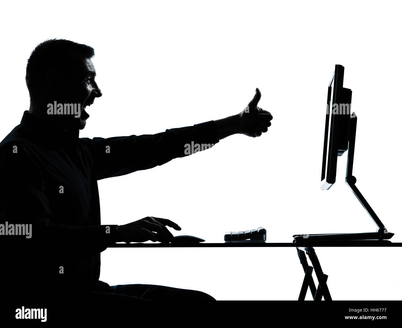 one caucasian business man computer computing silhouette in studio ... one caucasian business man computer computing silhouette in studio ...