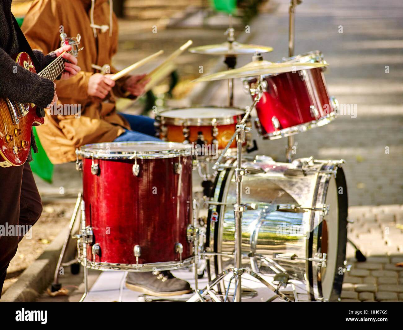 Festival music band. Friends playing on percussion instruments city ...