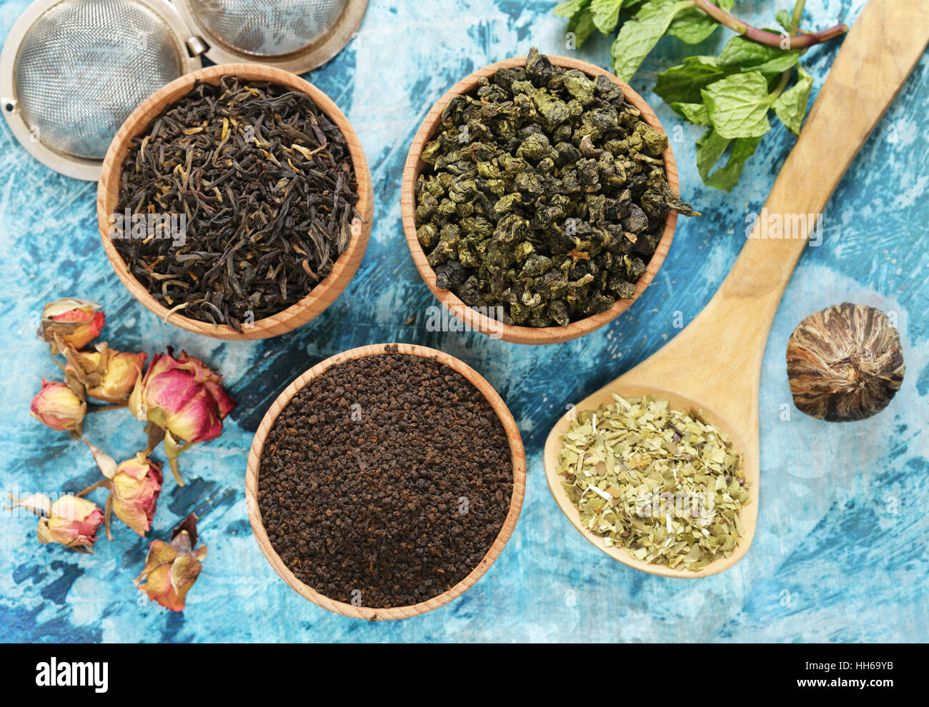 Different types of tea in a wooden bowl Stock Photo - Alamy