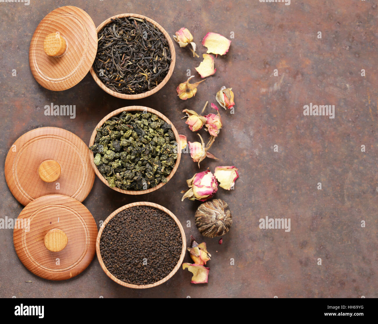 Different types of tea in a wooden bowl Stock Photo - Alamy