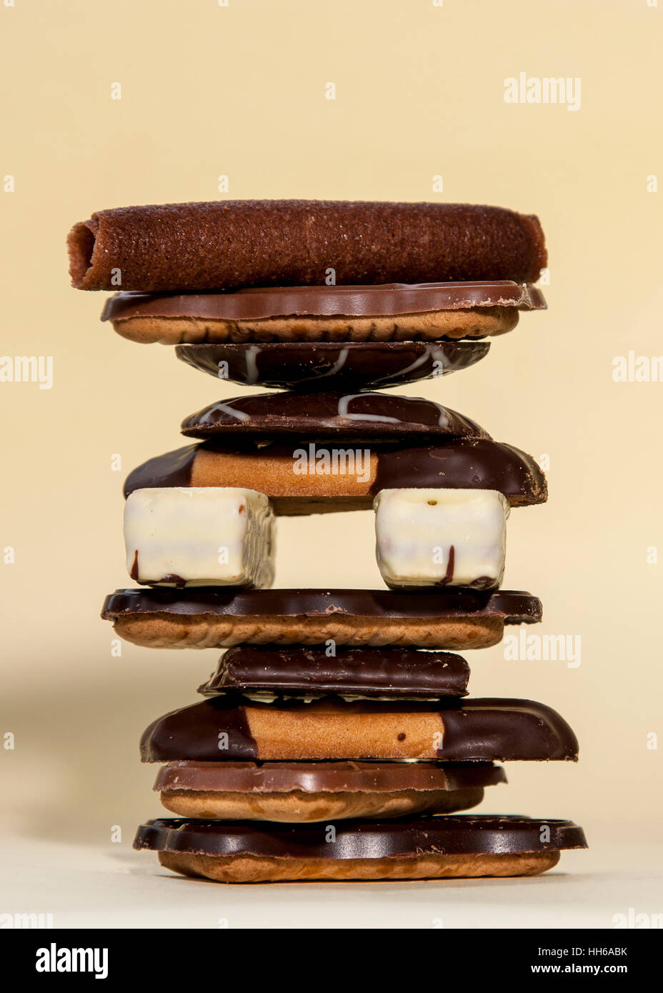 A stack, tower of chocolate biscuits Stock Photo - Alamy
