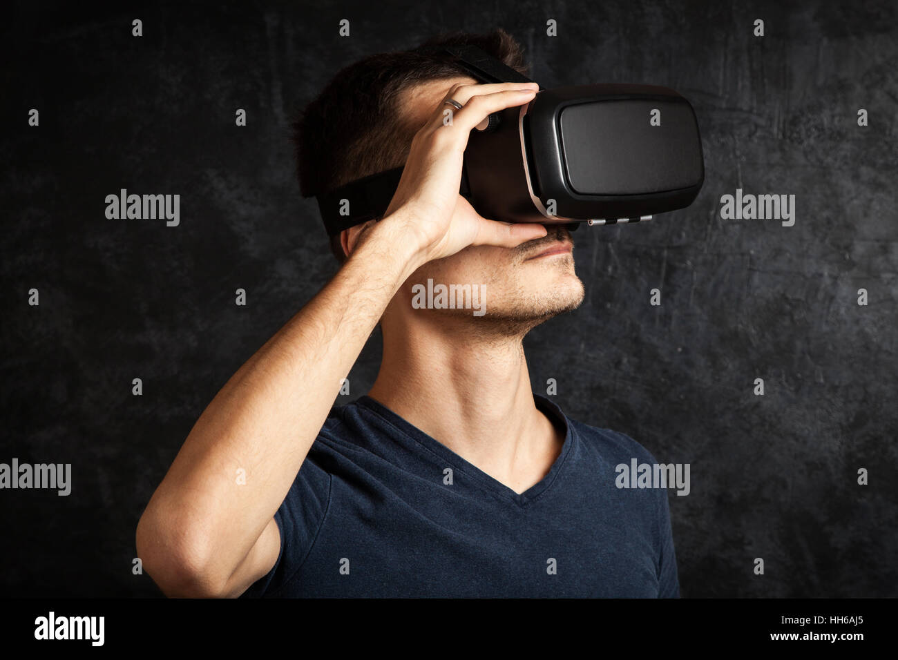 Man using VR goggles Stock Photo - Alamy