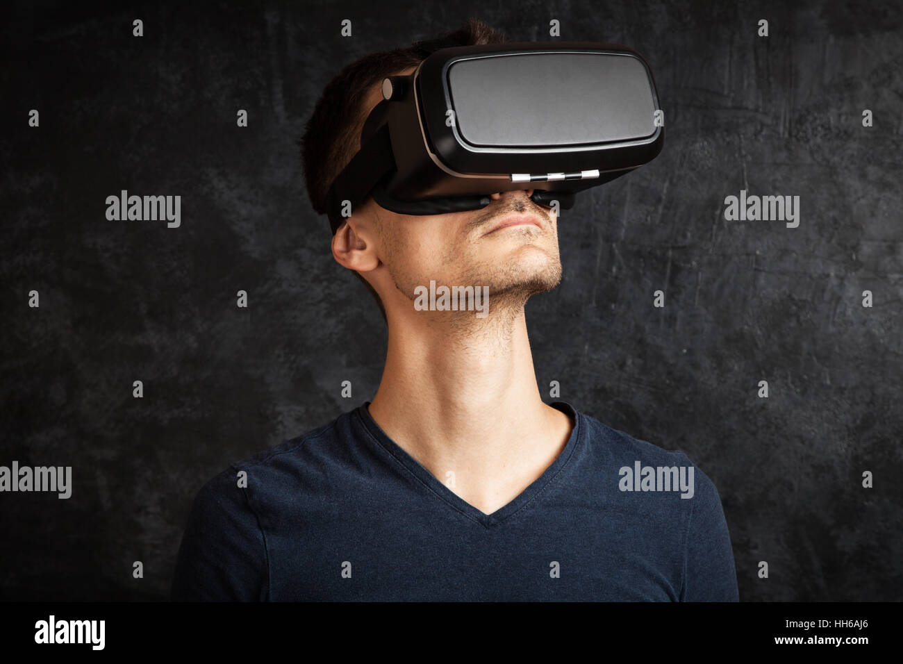 Man using VR goggles Stock Photo - Alamy