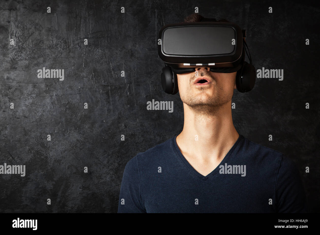 Man using VR goggles Stock Photo - Alamy