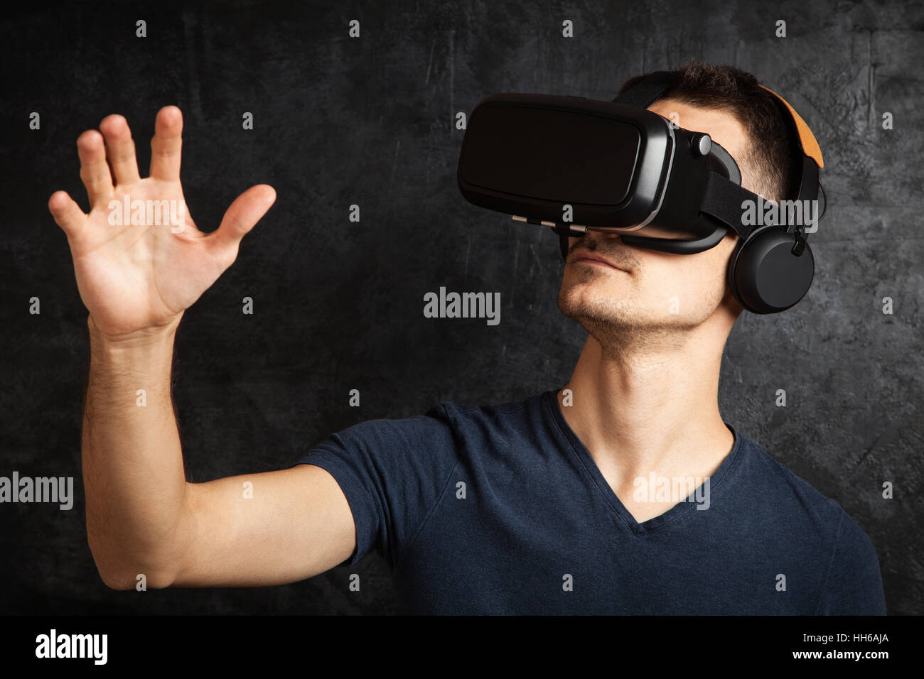 Man using VR goggles Stock Photo - Alamy