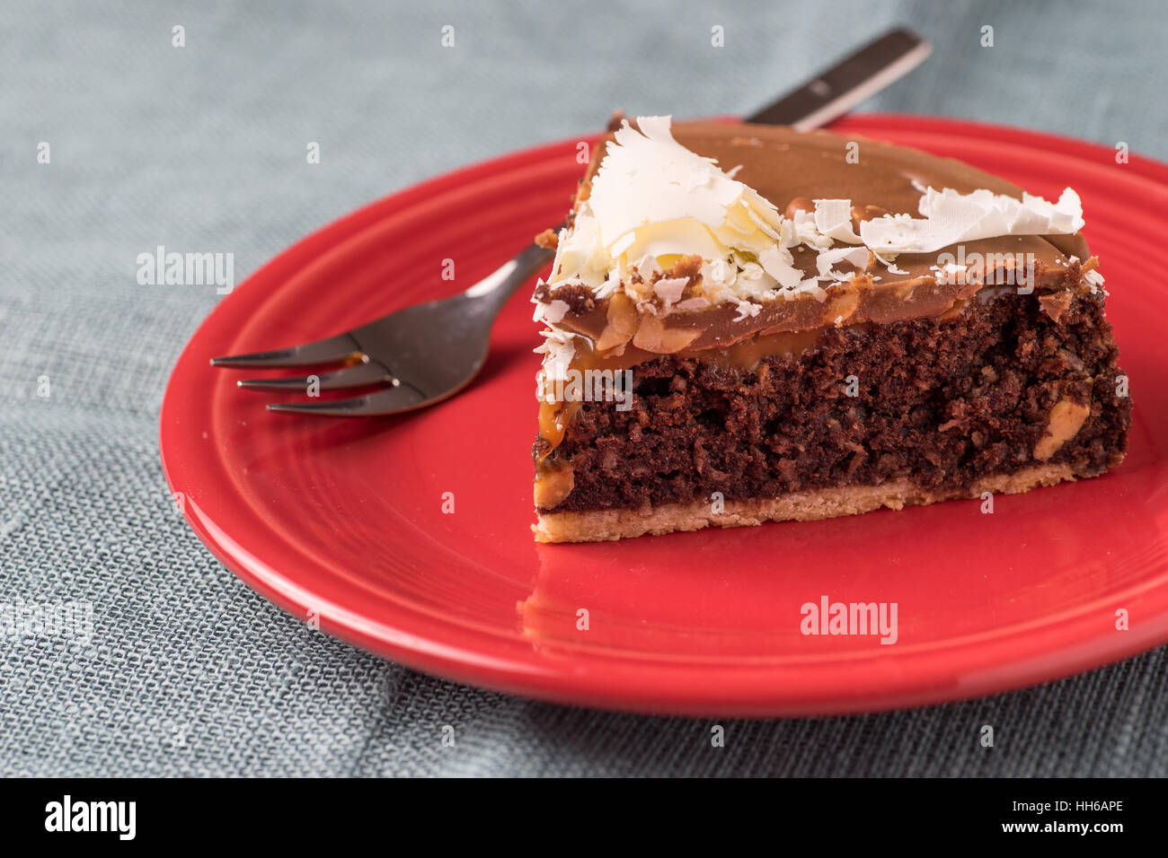 delicate chocolate cake decorated with white chocolate flakes Stock ...