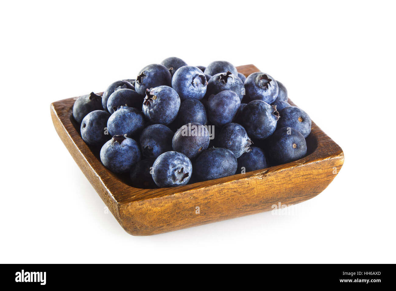 Blueberry in wooden bowl Cut Out Stock Images & Pictures - Alamy