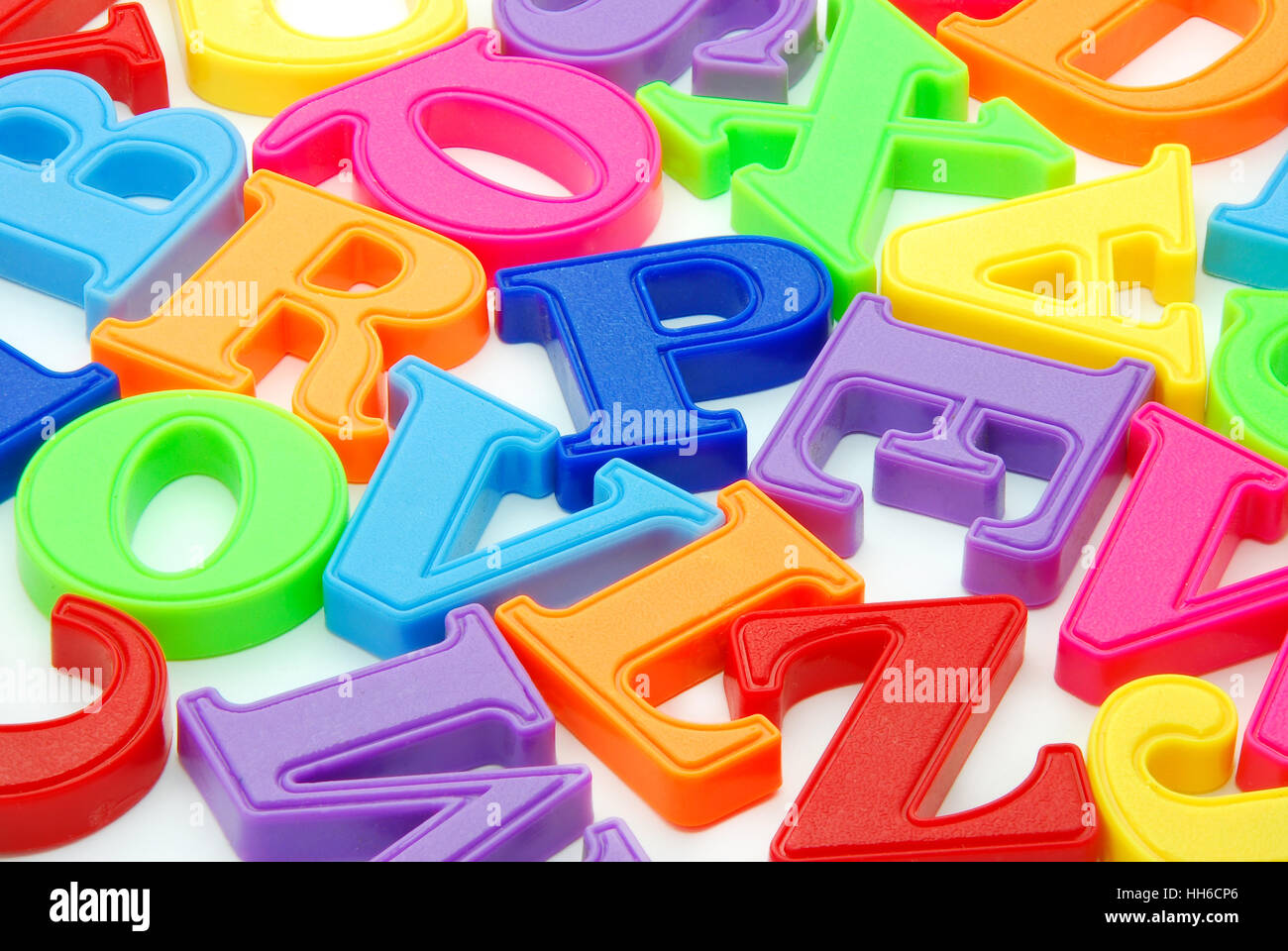 colored plastic letters background Stock Photo - Alamy