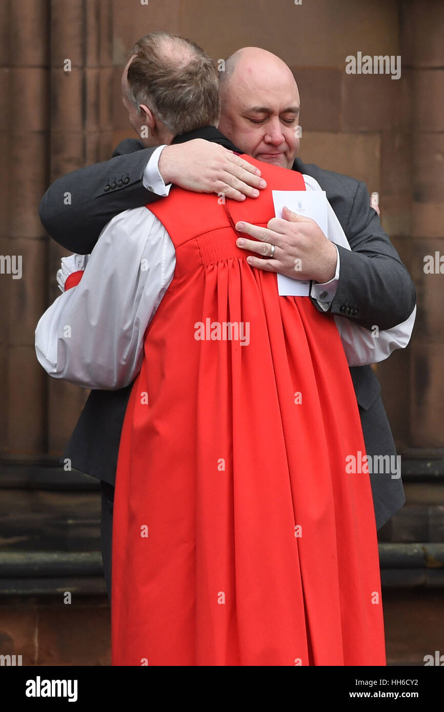 Jill Saward's husband Gavin Drake is comforted after her funeral at ...