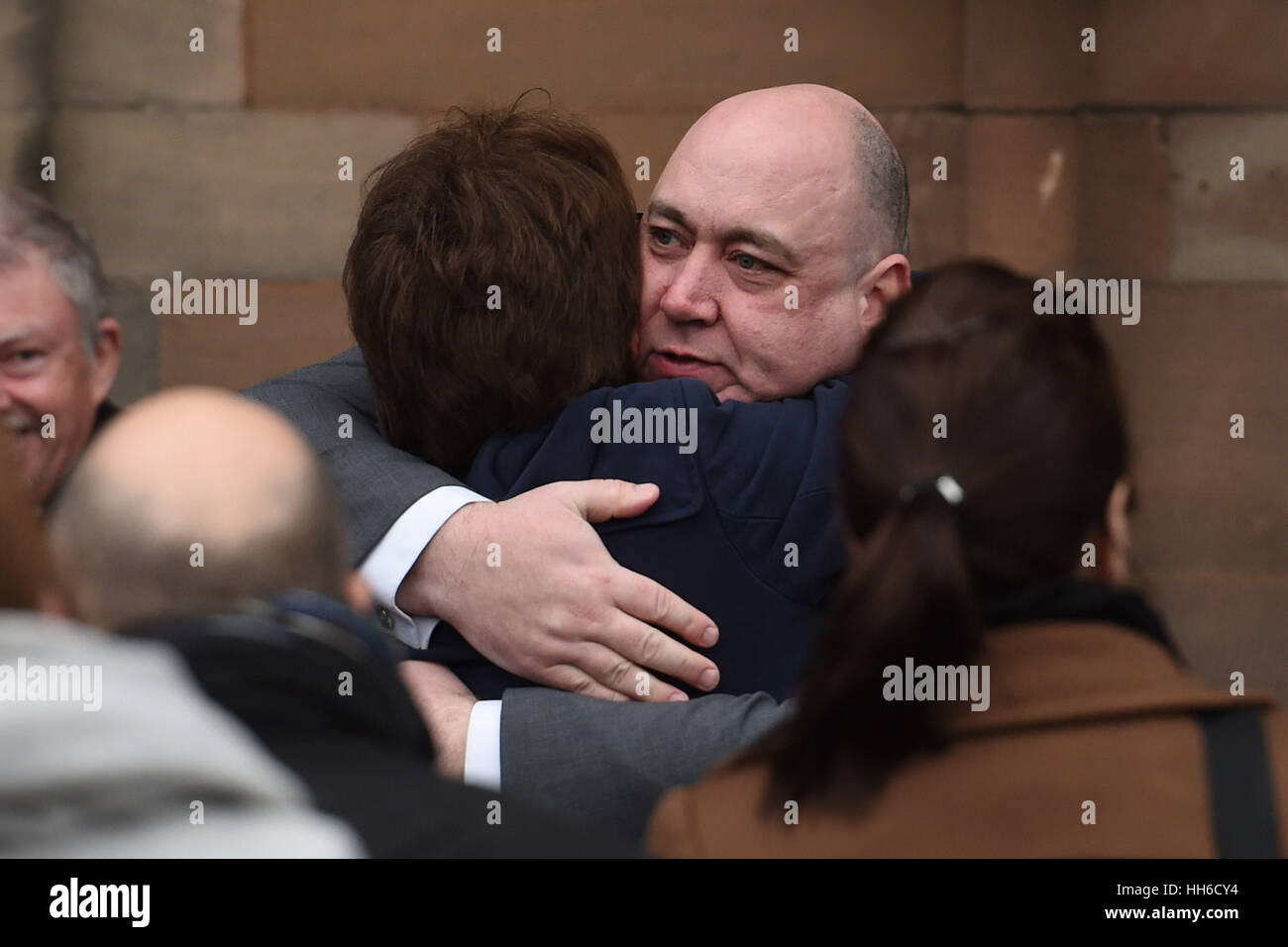 Jill Saward's husband Gavin Drake is comforted after her funeral at ...