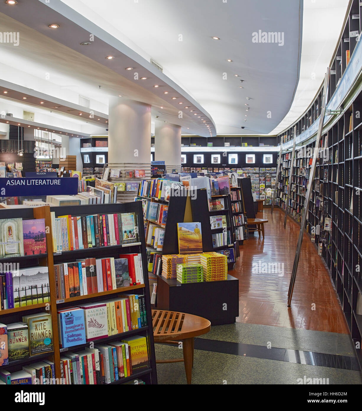 Areas of interest with bookshelf corridor. Kinokuniya Bookstore ...