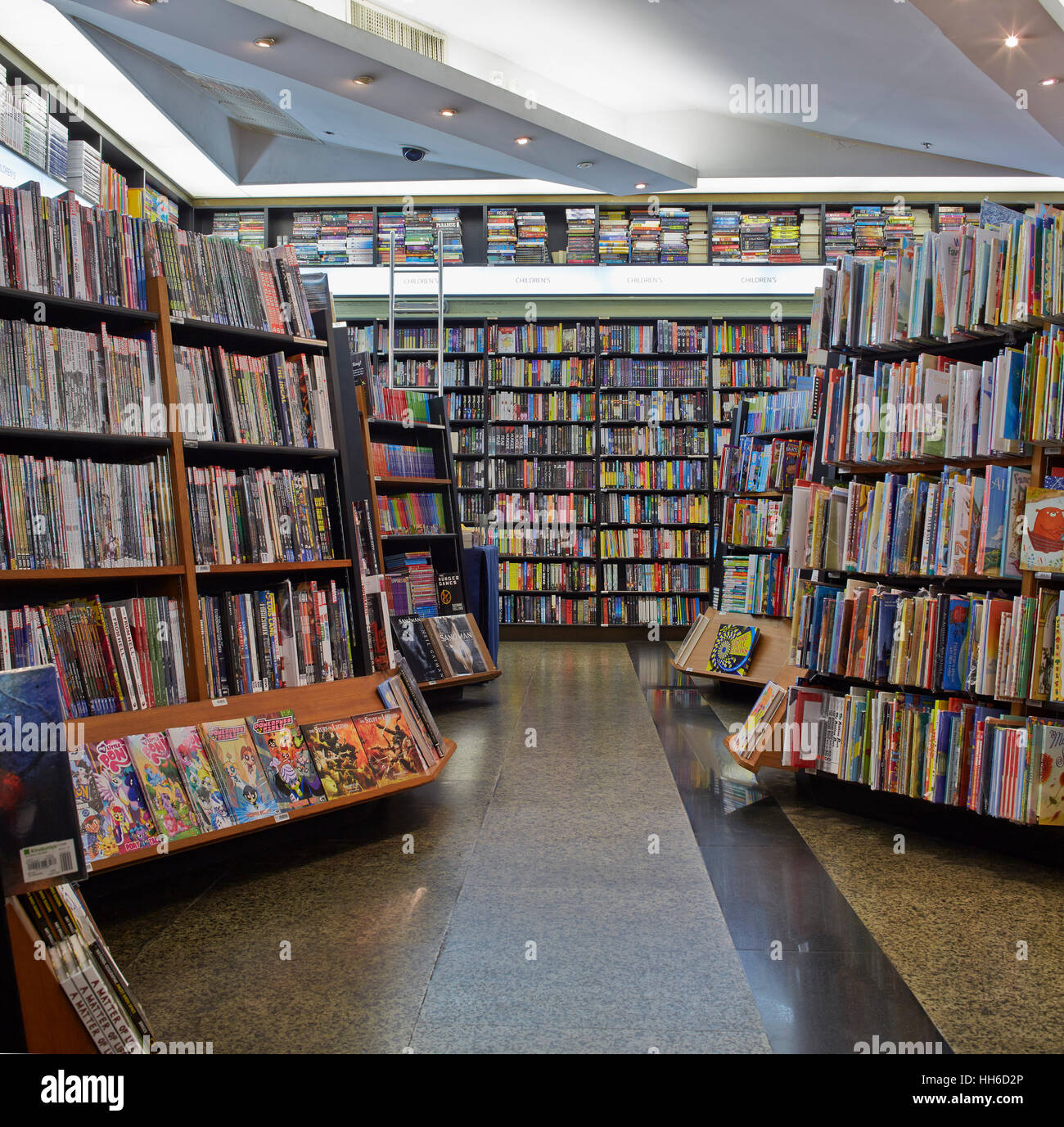 Areas of interest with bookshelf corridor. Kinokuniya Bookstore ...