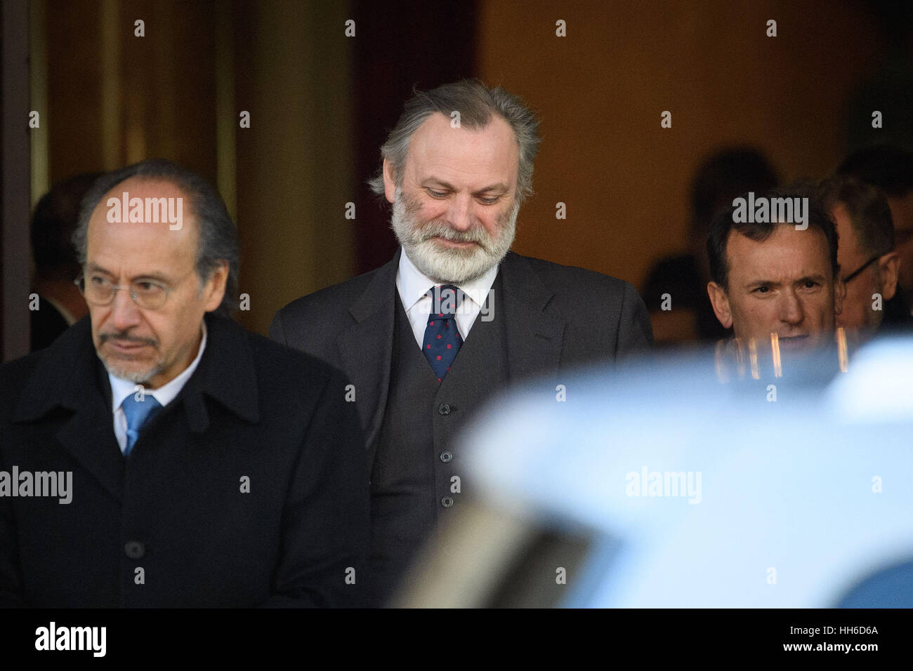 Ambassador for Britain Tim Barrow (centre) leaves after listening to ...