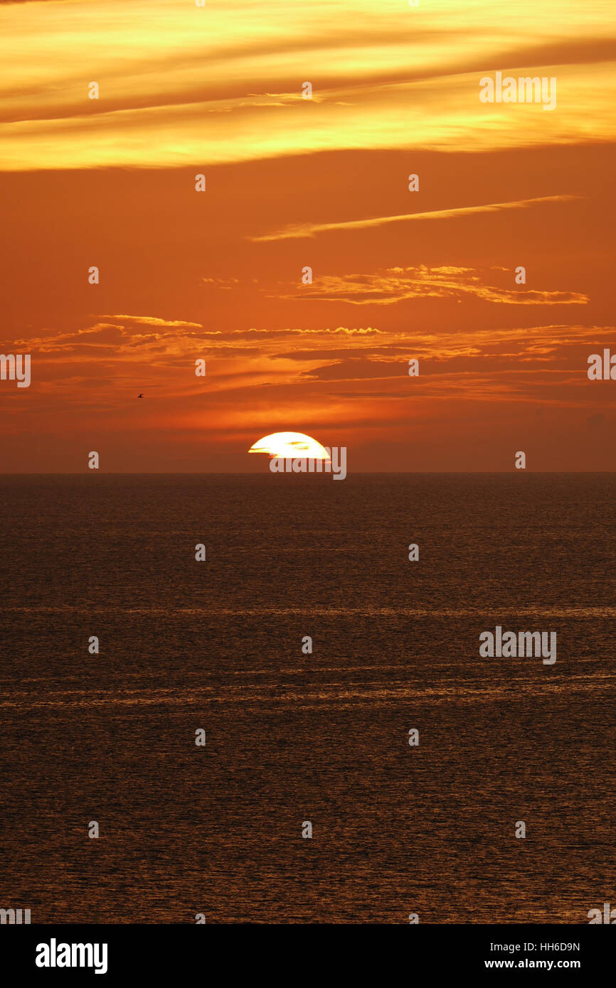 sun setting on a caribbean sea Stock Photo - Alamy