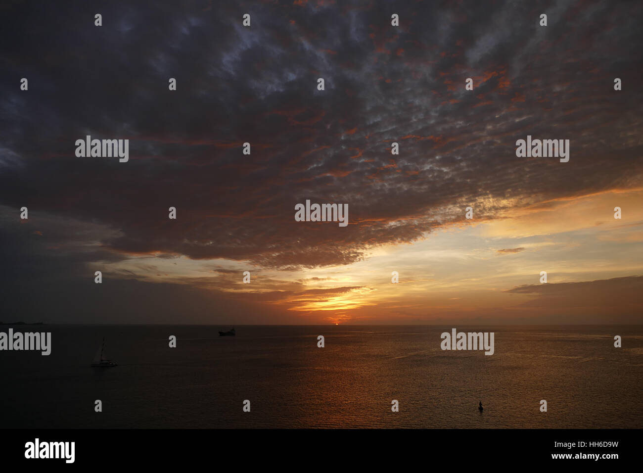 sun setting on a caribbean sea Stock Photo - Alamy