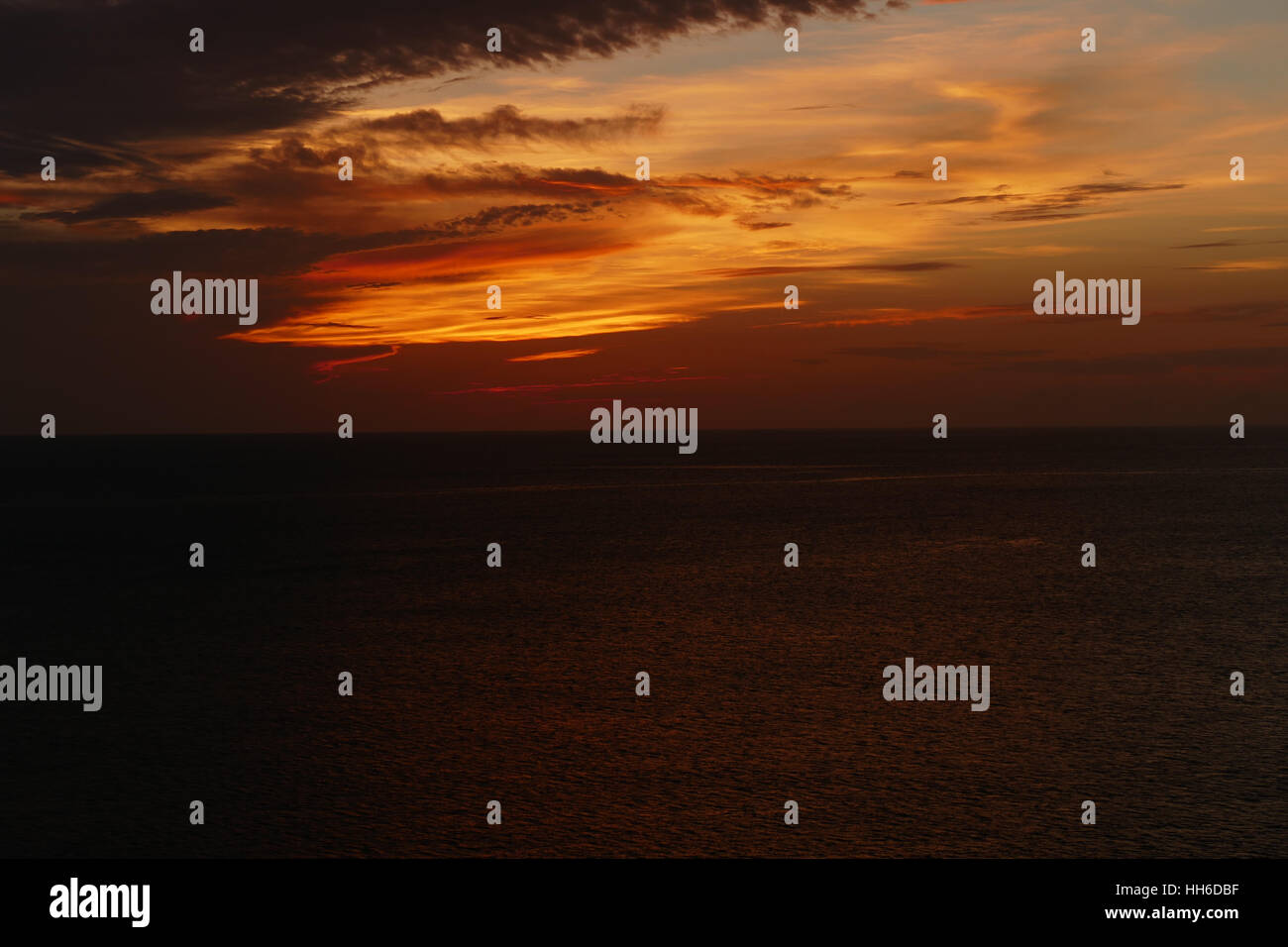 sun setting on a caribbean sea Stock Photo - Alamy