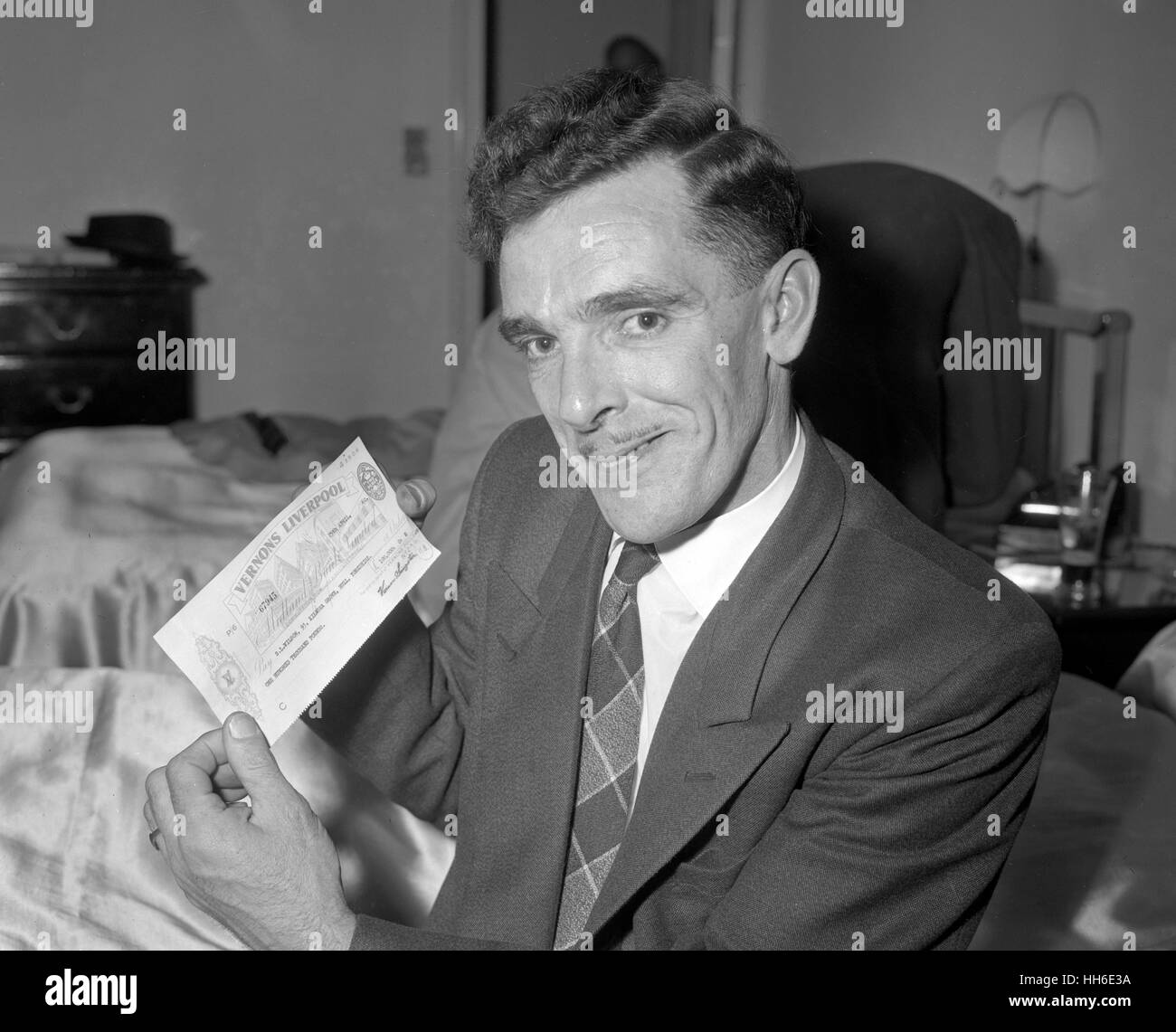 Stanley Wilson, 40, a £12-a-week joiner-builder from Hull, with a ...