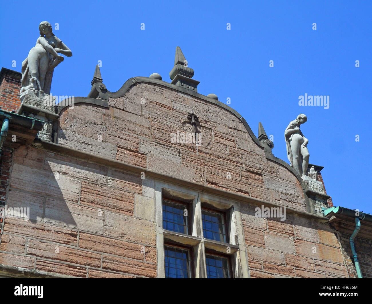 Stunning Sculptures on the Rooftop of a Bricked Building in Copenhagen ...