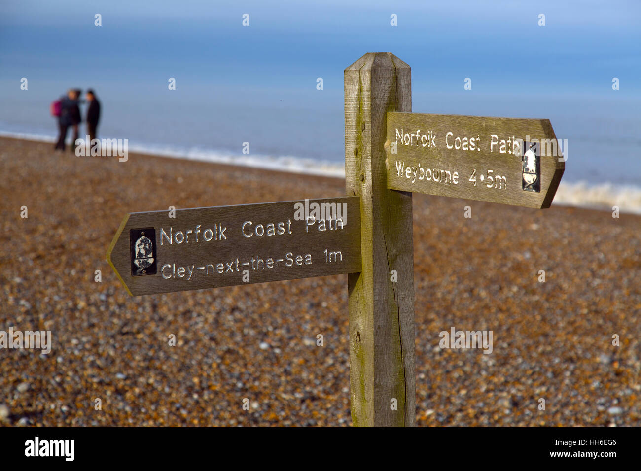 Footpath sign Cley beach Nature reserve Norfolk after a January tidal ...
