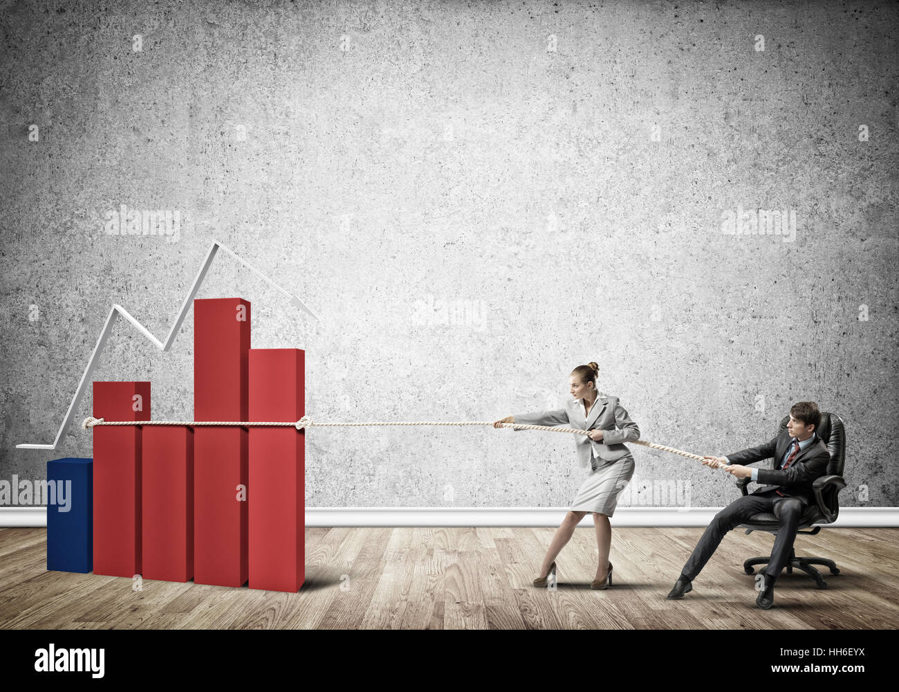 Businesspeople pulling with effort graph growth as a symbol of ...