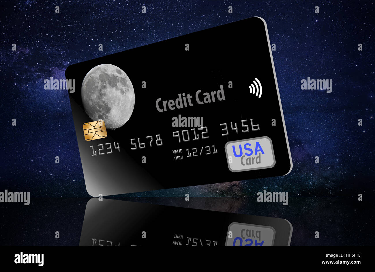 Black credit card with image of the moon. Sky and stars in background ...