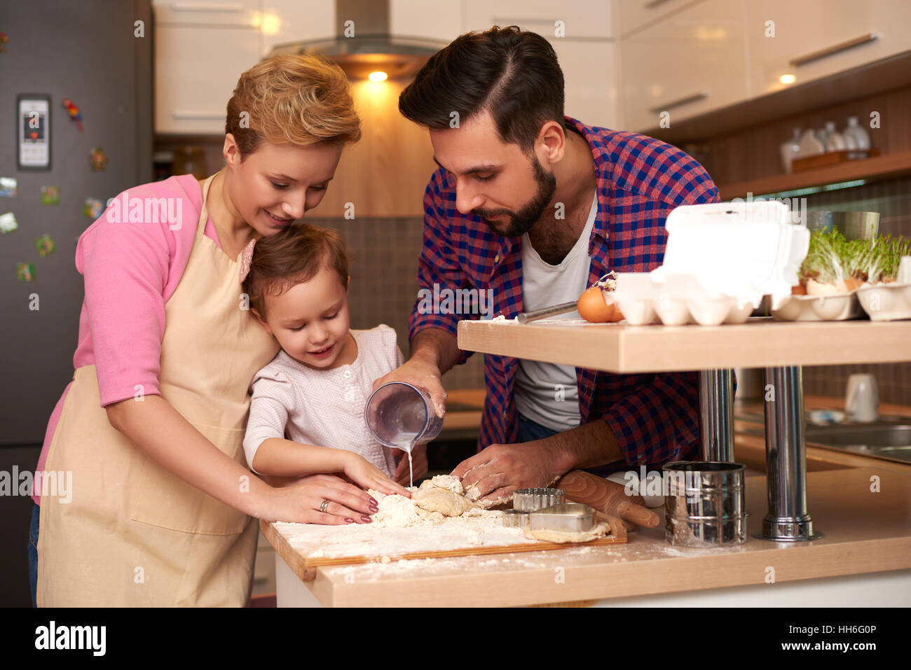 This little girl is a great helper Stock Photo - Alamy