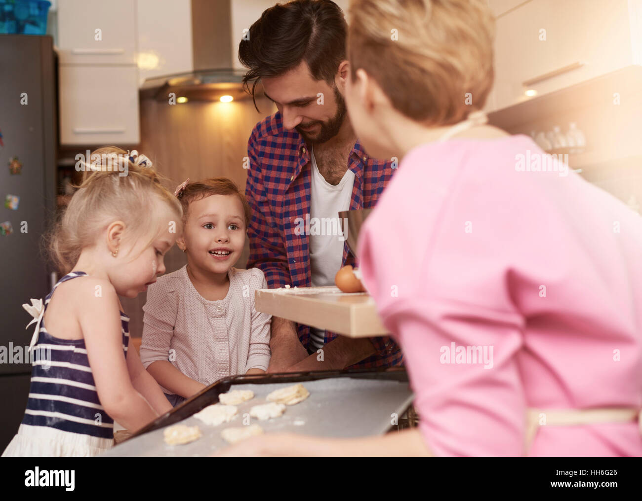Family baking of cookies Stock Photo - Alamy