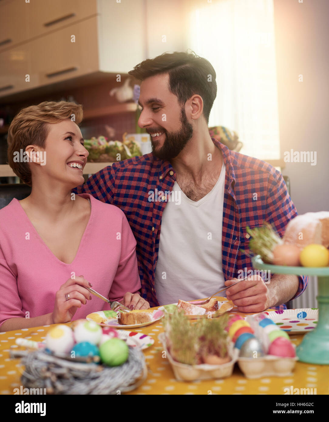 Happy couple celebrating Easter time Stock Photo - Alamy