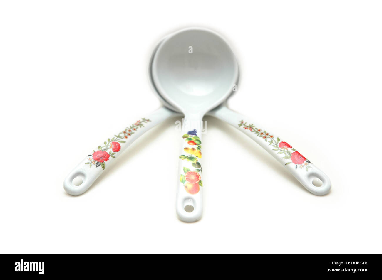 Plastic ladles isolated on white Stock Photo - Alamy