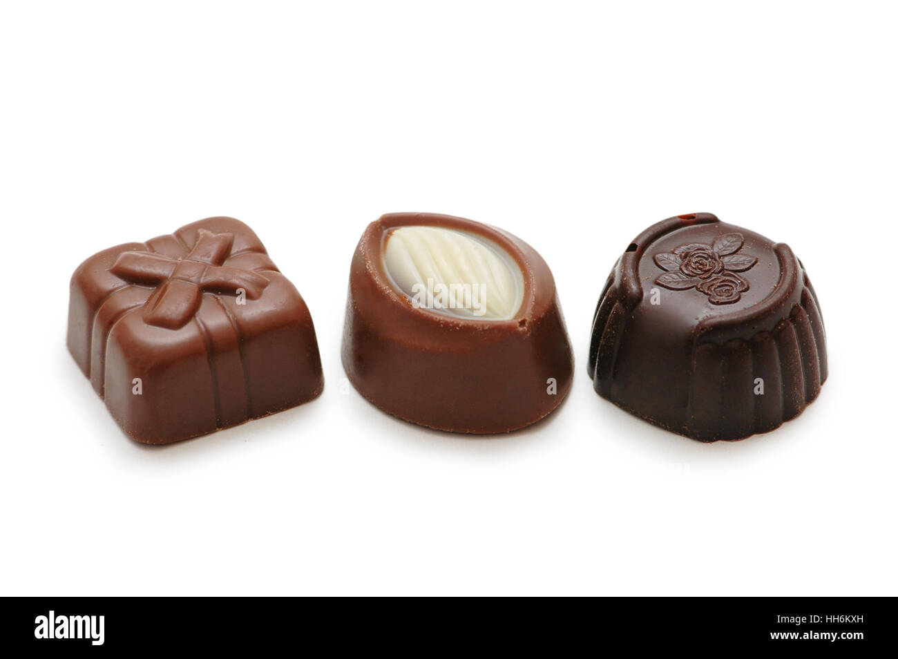 Three chocolates isolated on the white background Stock Photo - Alamy