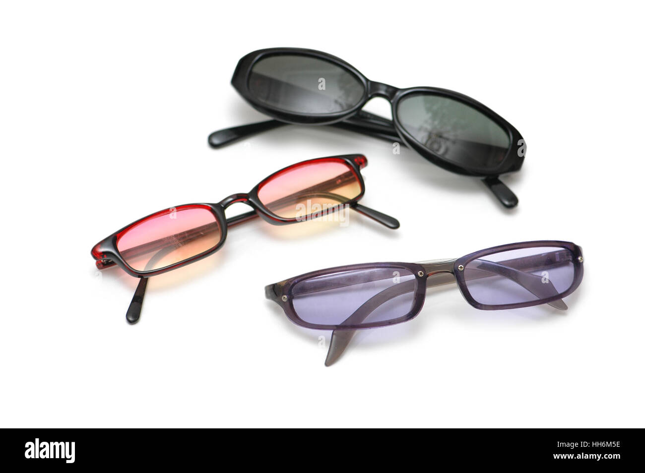 Three pairs of sunglasses isolated on white Stock Photo - Alamy