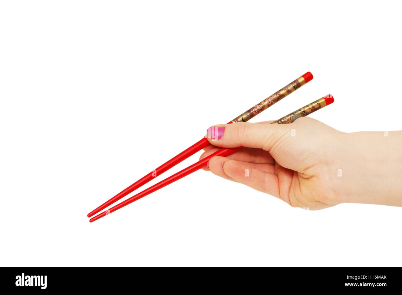 Hand with chopsticks isolated on the white Stock Photo - Alamy
