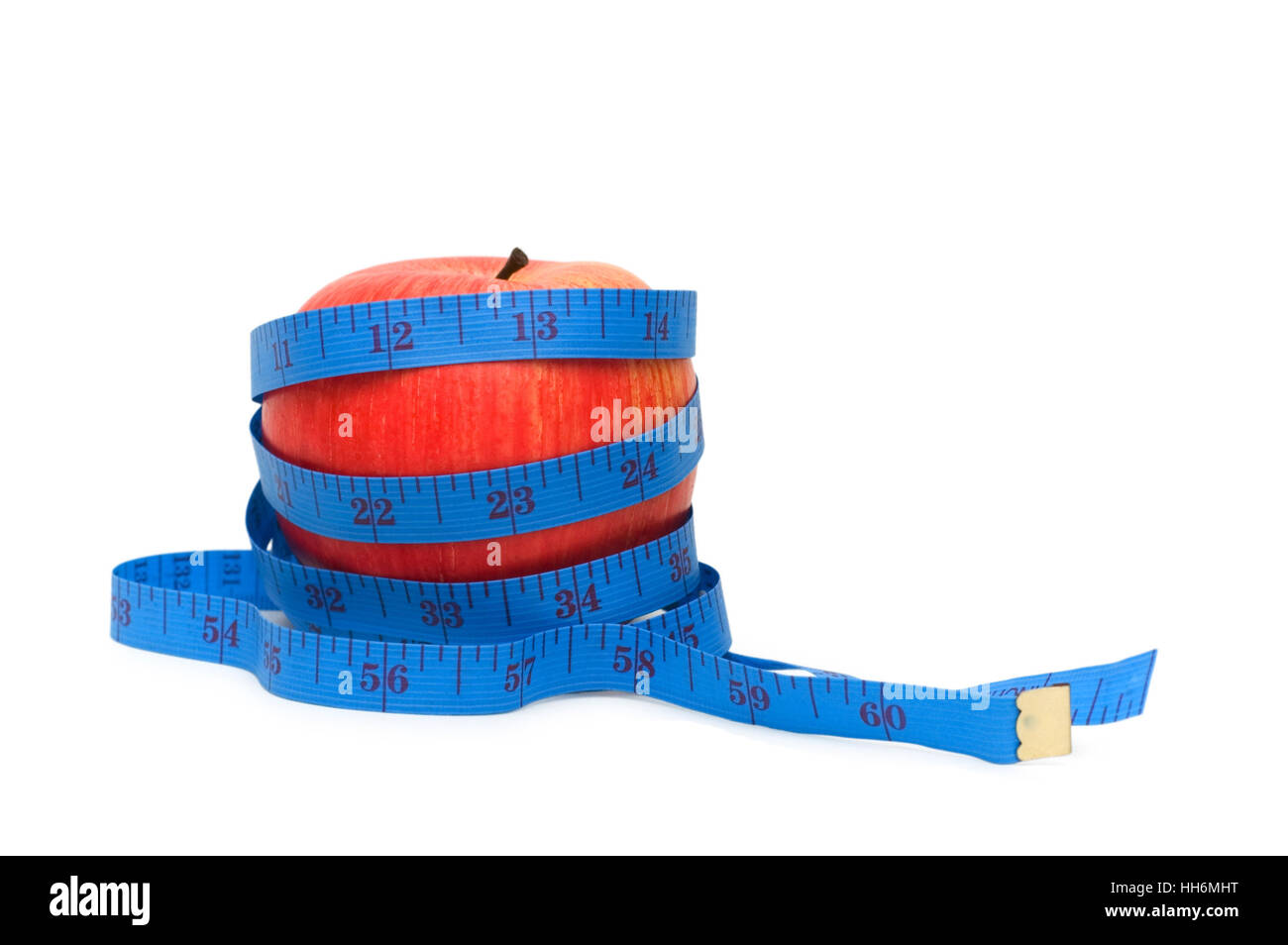 Red apple and meter illustrating fruit dieting concept Stock Photo - Alamy