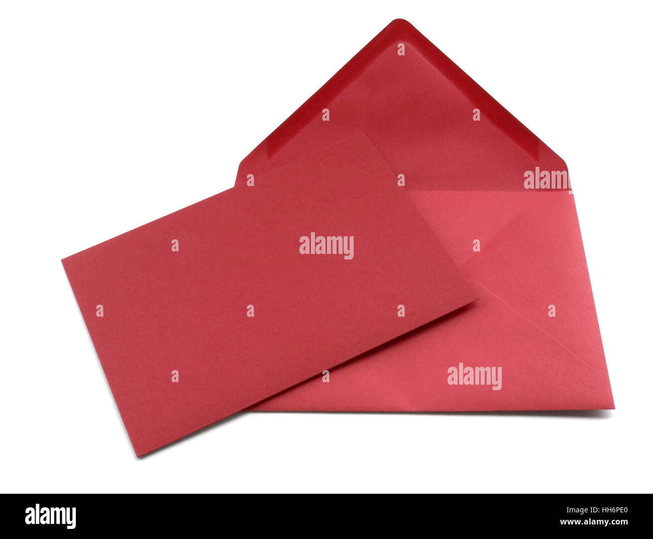 Studio photography of a red letter and envelope isolated on white, with ...
